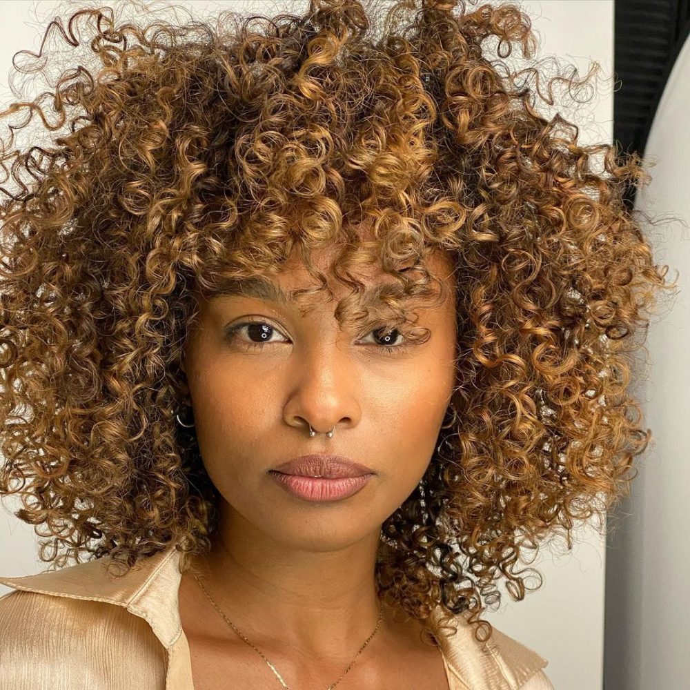 31 Best Curly Bob with Bangs for the Most Flattering Haircut & Hairstyle