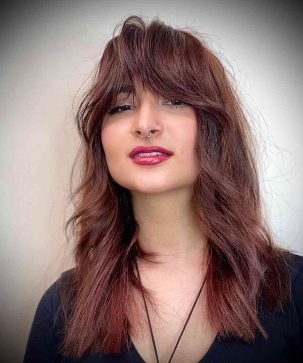 35 Trendy Ways to Get Bottleneck Bangs Right Now