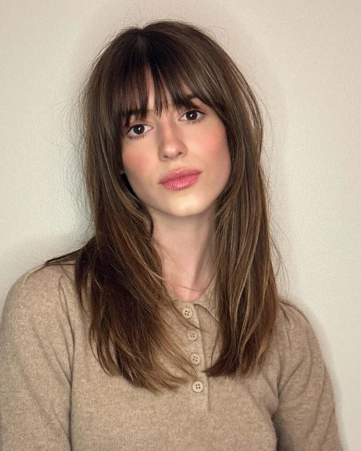 23 Chic Brow-Skimming Bangs That Flatter Every Face Shape