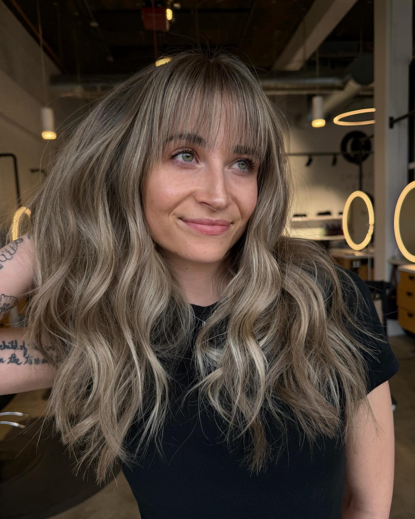 23 Chic Brow-Skimming Bangs That Flatter Every Face Shape