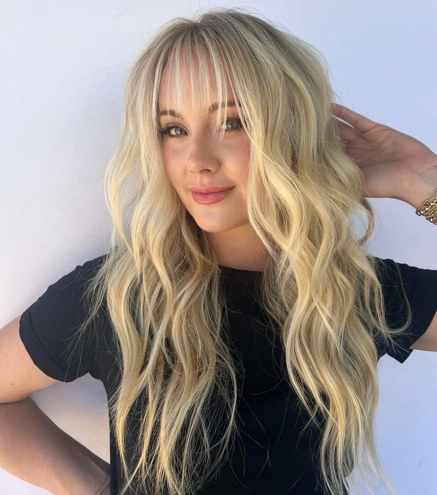 15 Flattering Hairstyles with Bangs for an Oval Face Shape