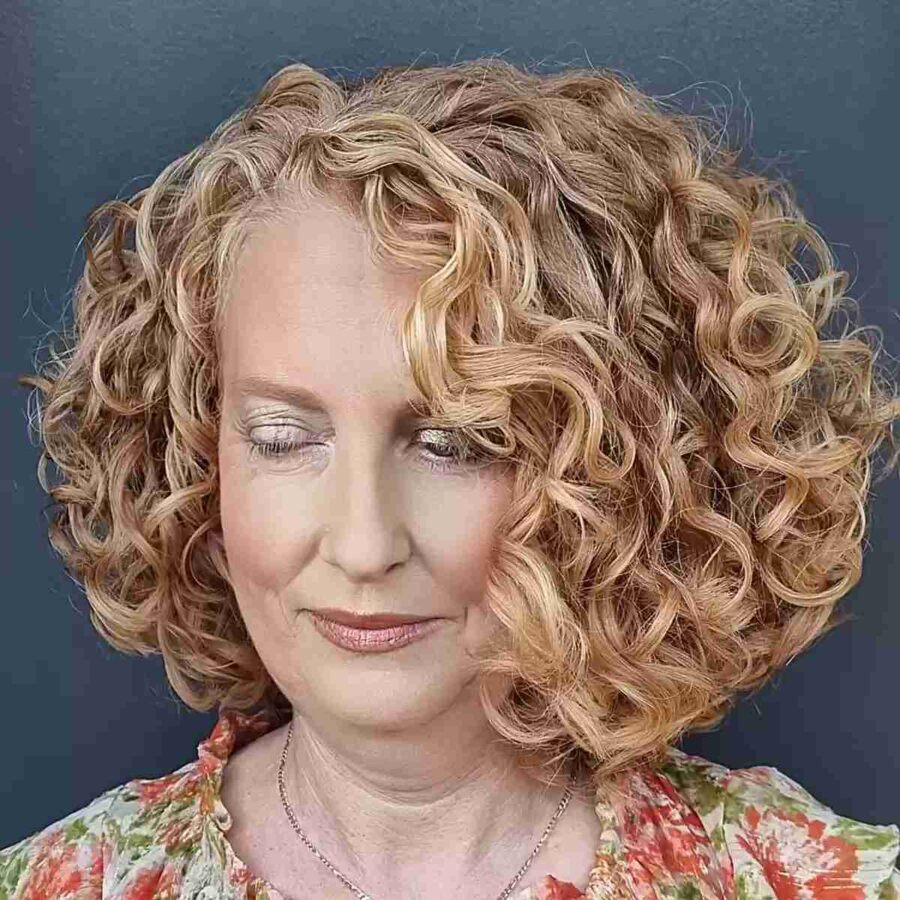 Curls That Wow: 28 Hairdos for Women Over 60 with Curly Hair