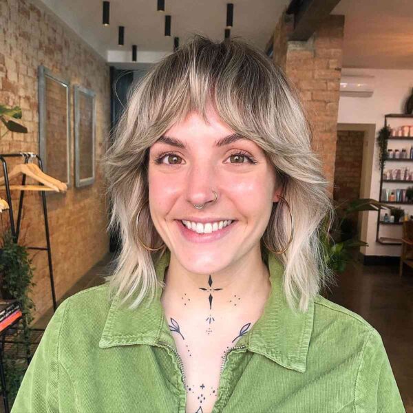 28 Trendy Ways to Get Bottleneck Bangs Right Now