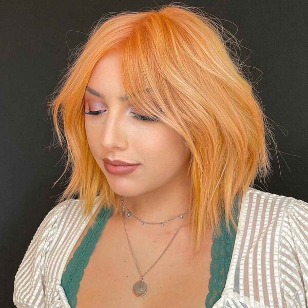 28 Slimming Hairstyles for Women with Full Faces (for Plus-Sized Women)