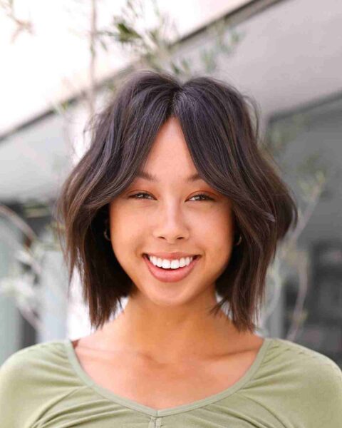 29 Cutest Wavy Bobs with Bangs Women Are Getting Right Now