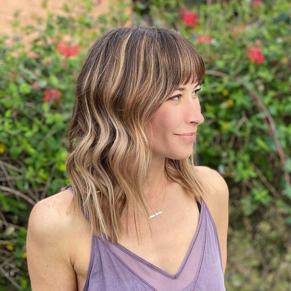 33 Ways to Pair Wavy Hair with Bangs for a Super-Flattering Look